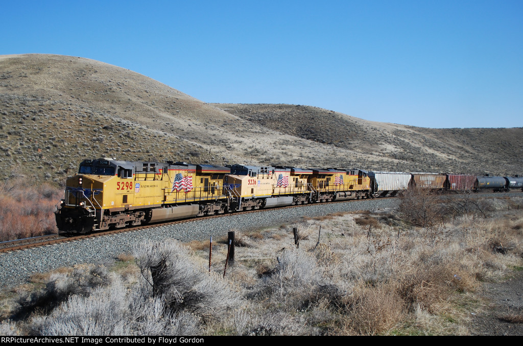 UP 5298 leads UP freight up grade within the Burnt River Canyon